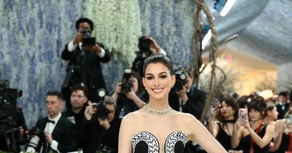 Anne Hathaway’s Hand-Painted Michael Kors Look At The 2026 Met Gala ...