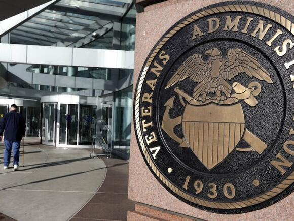 Small group of veterans, workers and advocates rally against VA layoffs ...