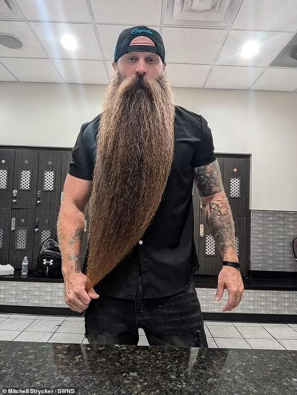 He's the mane man! TikTokker dad-of-two with 3ft beard reveals how he ...