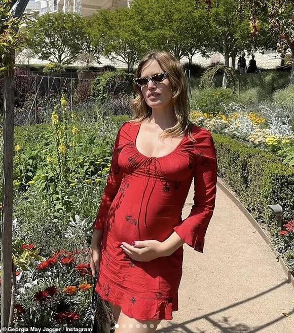 Georgia May Jagger displays her growing baby bump as she shares ...