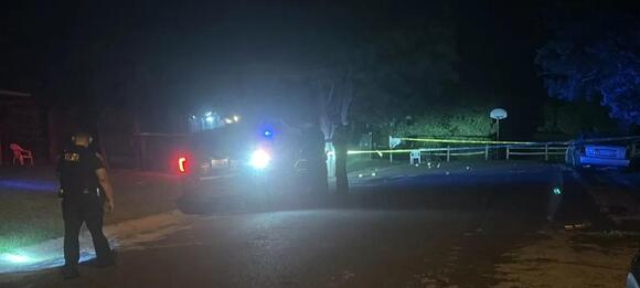 Police tape up, evidence markers placed after shots were fired in ...