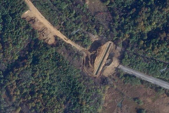 North Korea satellite images show mystery trenches dug at border