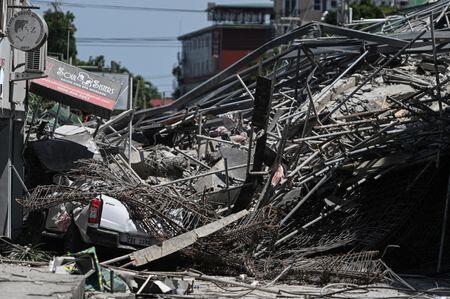 At least one dead in Philippine building collapse, 21 people missing ...