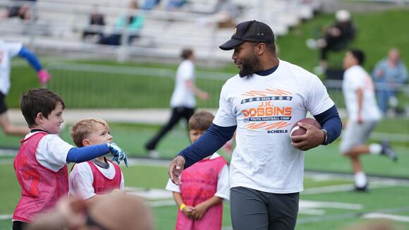Broncos RB J.K. Dobbins instilled valuable lessons at youth camp in ...