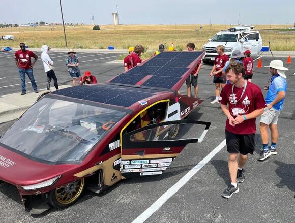 Glowing with pride, solar car drivers cross the finish line in Wyoming ...