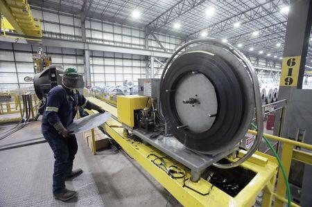 US factory production flat in May; AI investment supporting ...