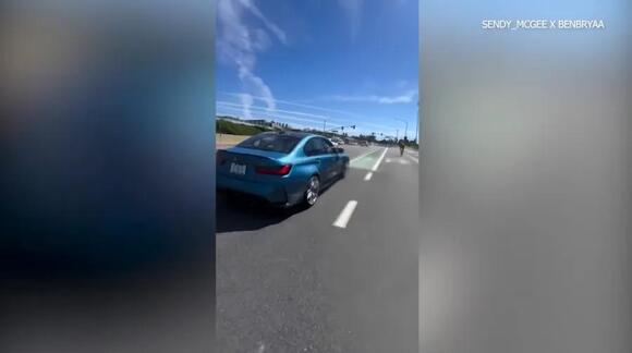 WATCH: Competitive cyclists nearly run down by raging California ...
