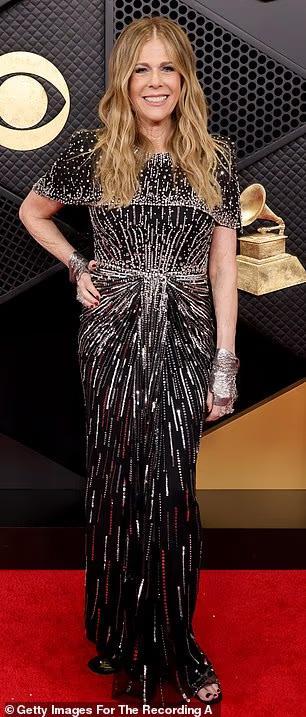 Rita Wilson poses with rarely seen granddaughter Olivia Hanks, 15, at ...