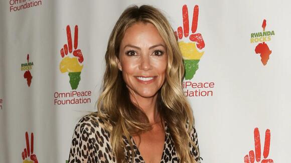 Kevin Costner’s Ex Christine Baumgartner Shows Off $50K Engagement Ring ...