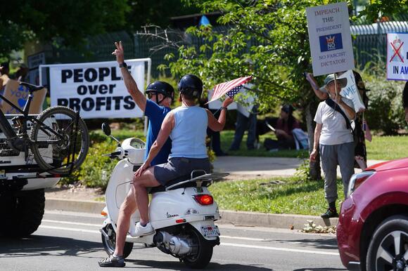 Redding protesters crowd City Hall lawns for anti-Trump No Kings rally ...