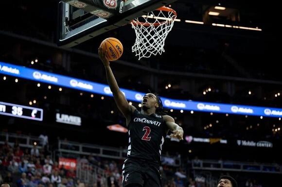 Jizzle James scores career high to vault Cincinnati past Bradley in NIT