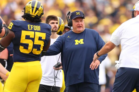 Michigan head football coach jailed hours after firing for ...