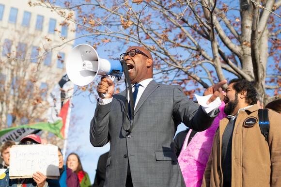 Hundreds rally against Kristi Noem’s visit amid fears of increased ICE ...