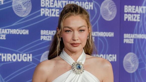 Gigi Hadid Drops Jaws in Sleek White Dress at Breakthrough Awards Red ...