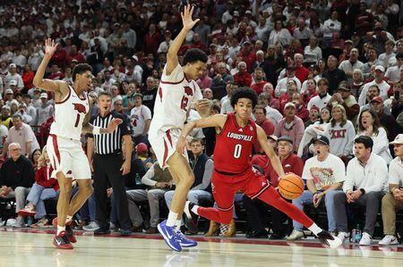 Louisville star freshman Mikel Brown Jr. (back) won’t play at Cal ...