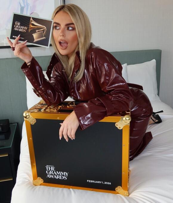 Singer-Songwriter Tallia Storm Rocks Bold Burgundy Suit at Grammy House ...
