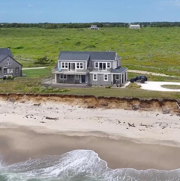 Beach erosion leaves Nantucket vacation home in peril — watch the ...