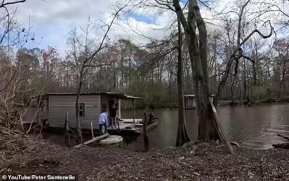 Off-grid couple who fled mainstream society to live on a houseboat deep ...