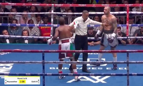 Floyd Mayweather appears to fire referee in middle of John Gotti III ...