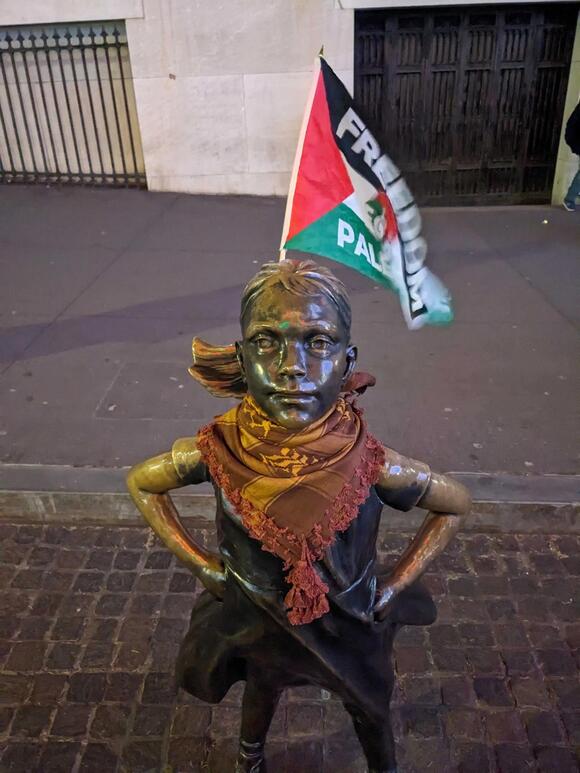 Wall Street’s ‘Fearless Girl’ dressed up in pro-Palestinian garb by ...
