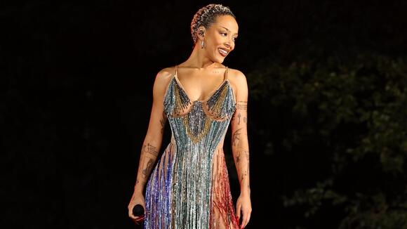 Doja Cat Dials It Down in Bodysuit With Bold Neckline for Peru Concert ...