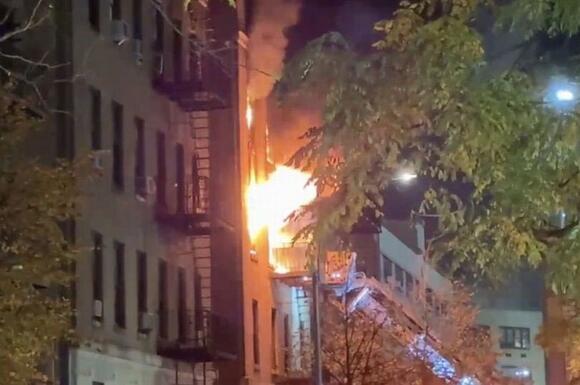 Massive fire erupts in Manhattan apartment complex as residents urged ...