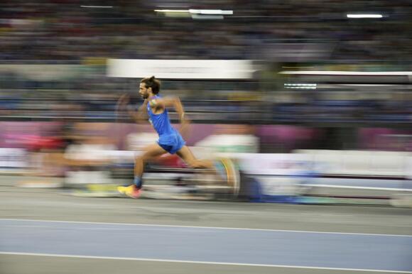 Italian Olympian breaks high-jump record before faking injury, jokingly ...