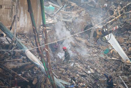 Rescue workers clearing Karachi inferno ruins, 63 missing feared dead ...