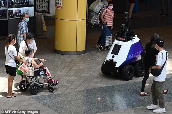 Real-life Robocop! Robot police officers will patrol the streets by ...