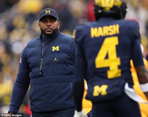 Married Michigan coach jailed in shock incident hours after $30M firing ...