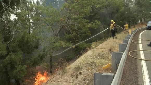 Fire crews aggressively attack the Line Fire along Highway 38 near ...