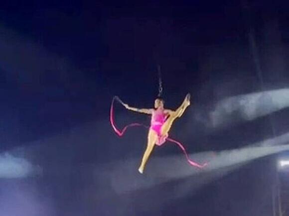 Circus acrobat crashes to ground in terrifying 'hair hanging' act as ...