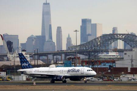 JetBlue's quarterly loss widens on muted demand for economy seats ...