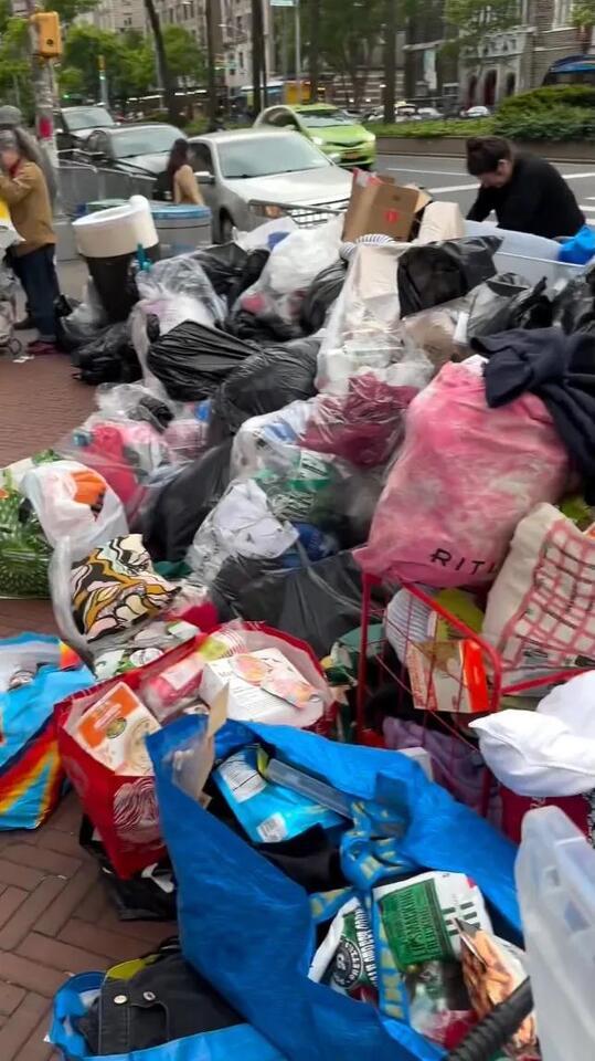 Columbia encampment supplies trashed outside school alongside $1K duvet ...