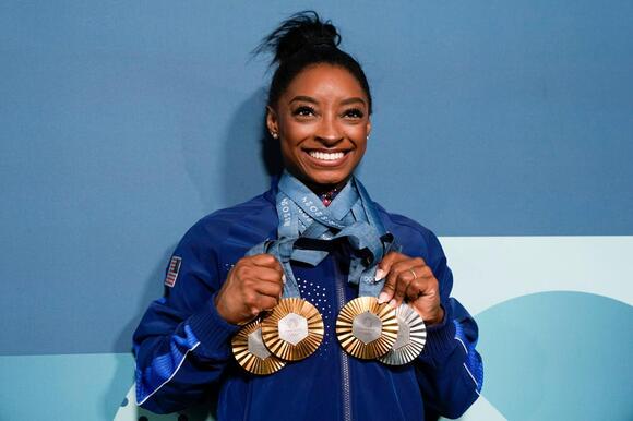 Simone Biles corrects club sign that miscalculated her Olympic medal ...