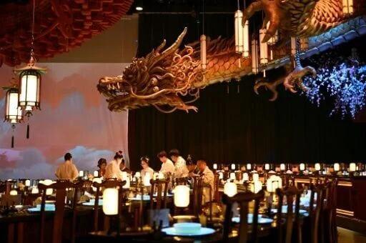 Diners were ushered into a grand, circular room, served by waiters ...