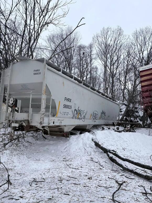 Wine Coolers? Multiple train cars transferring wine derailed in snow ...