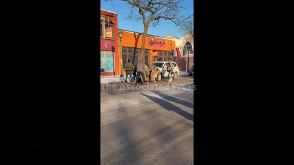 Protesters demand immigration agents leave Minneapolis after man is ...