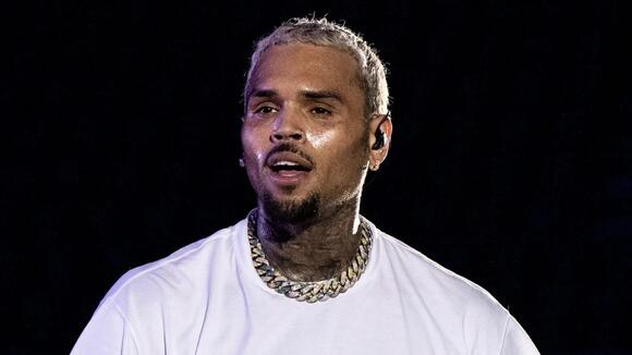 Whew! These Fans Were Tusslin’ After Chris Brown Threw His Jacket Into ...