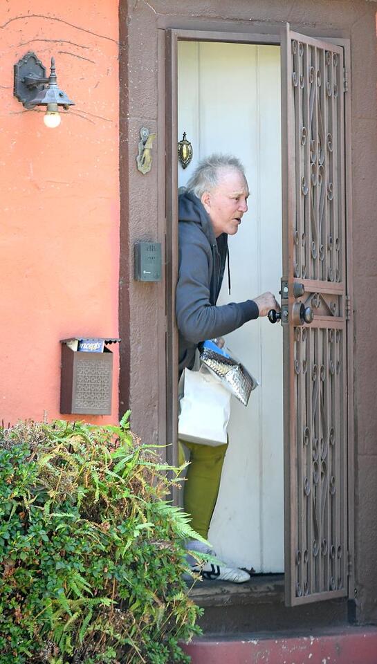 Disheveled Mickey Rourke, 72, spotted in rare outing after scandal in ...