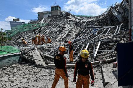 At least one dead in Philippine building collapse, 21 people missing ...