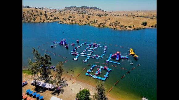 ‘Largest floating inflatable water park' reopens near Merced. What's ...