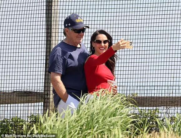 New footage of 'creepy' Belichick's walk of shame as Jordon Hudson's ...