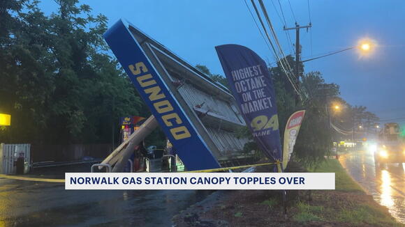 Storm damage: Canopy of Norwalk gas station topples over on Main Avenue ...