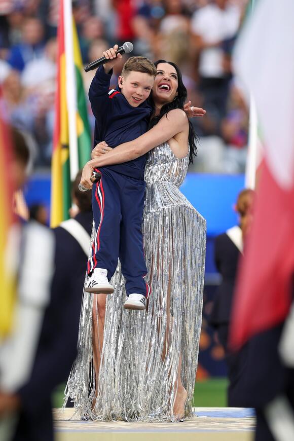 Katy Perry Glitters in Silver Sequin Dress While Performing at 2026 ...