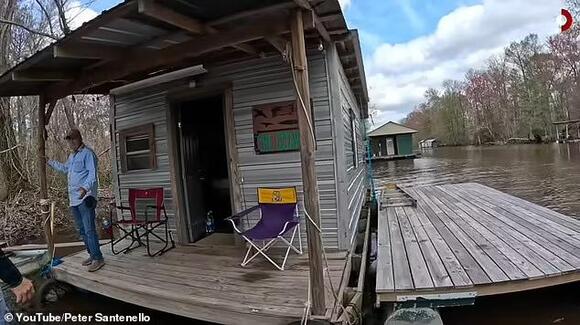 Off-grid couple who fled mainstream society to live on a houseboat deep ...