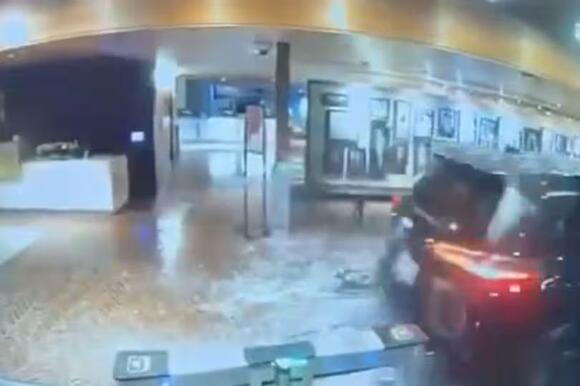 Horrifying video shows moment car armed with a bomb crashes into ...