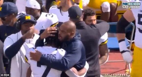 Michigan coach and ex-NFL running back Mike Hart, 36, is rushed to ...