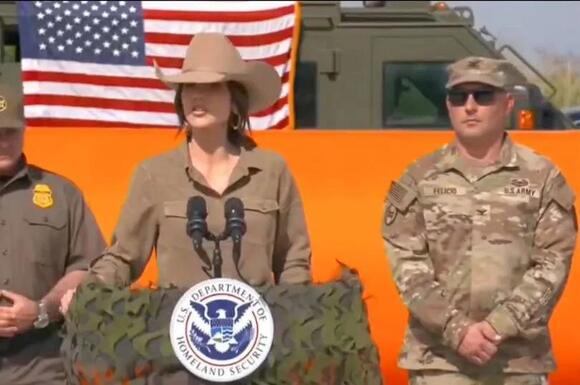 Kristi Noem hides face under massive 'stupid' cowboy hat as she gives ...