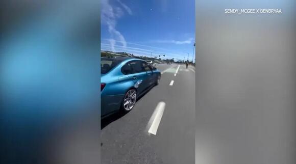 WATCH: Competitive cyclists nearly run down by raging California ...